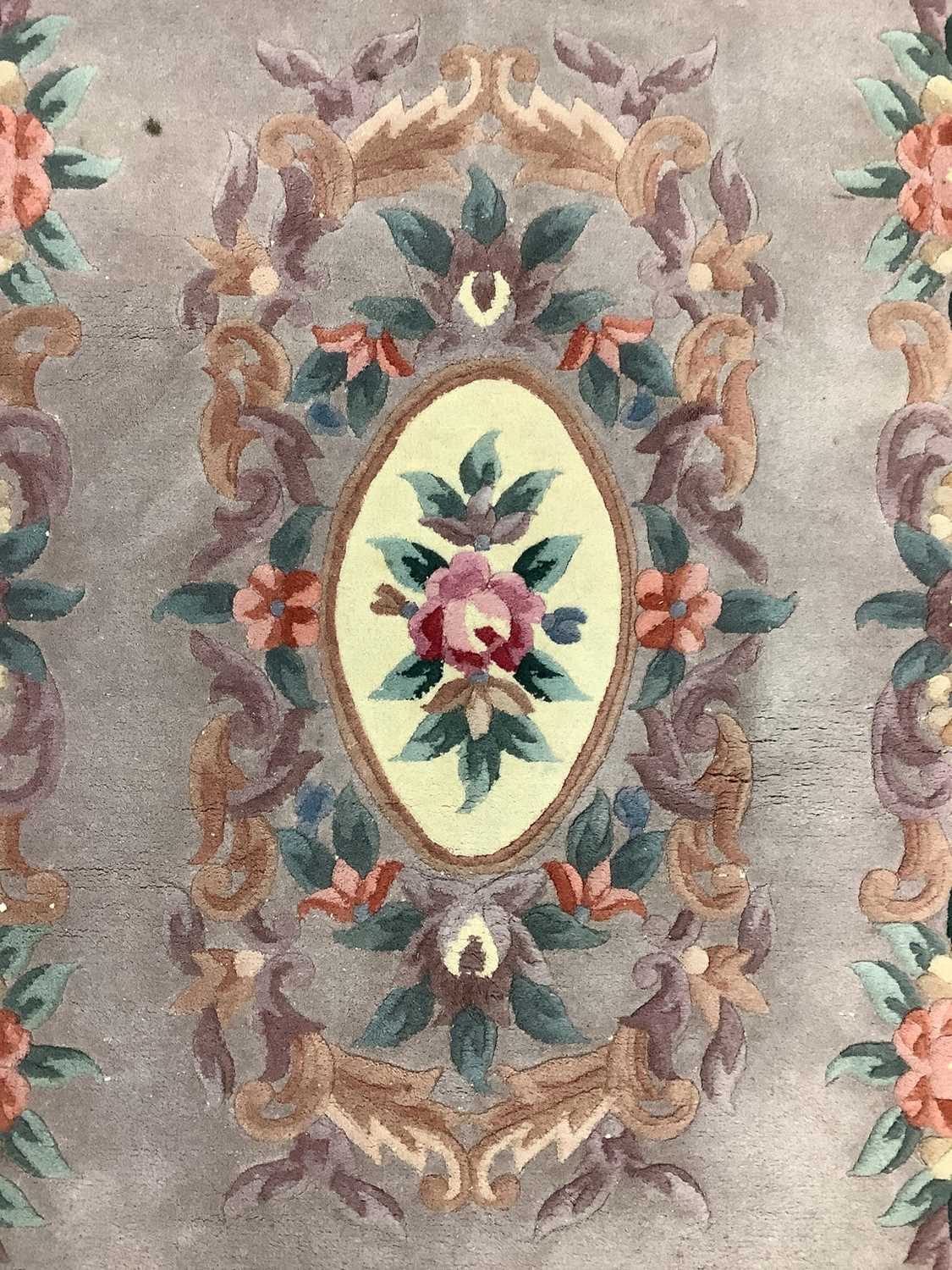 Lot 1060 - Chinese rug with floral decoration, 191cm x