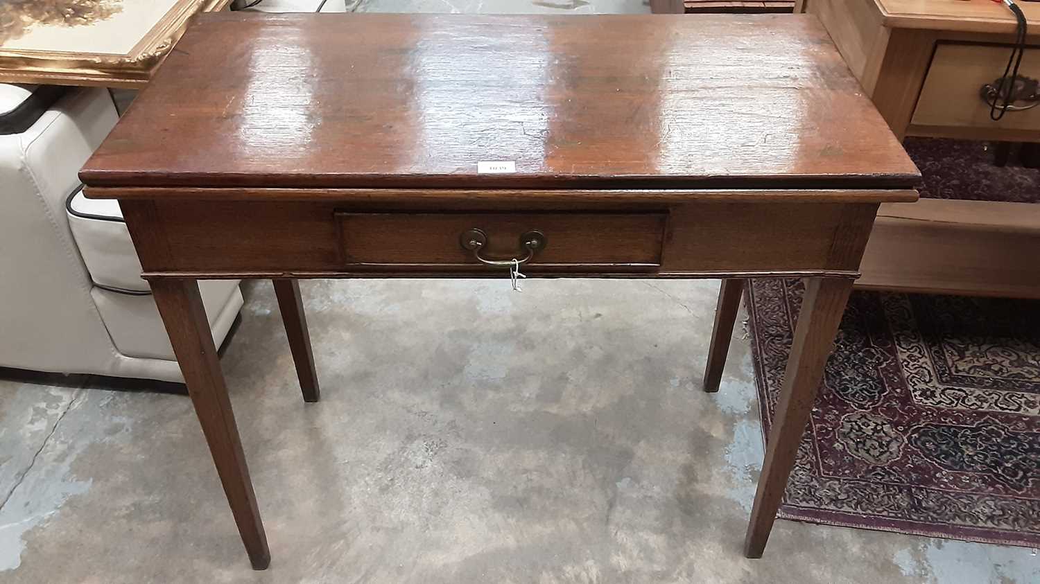 Lot 1039 - Nineteenth century oak tea table with