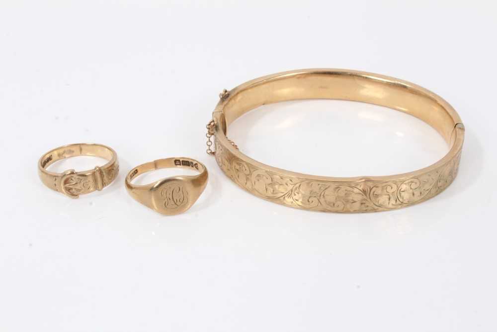 Lot 304 - 9ct gold bangle and two 9ct gold rings