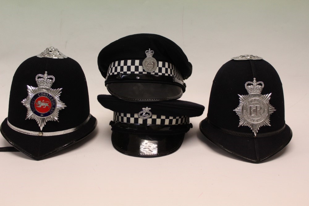 Lot 868 - Lot Police helmets and caps