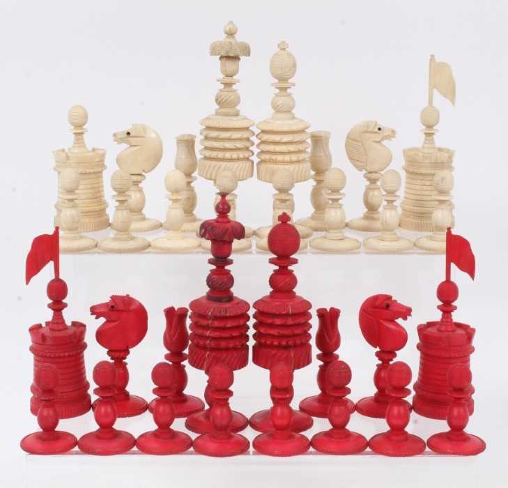 Lot 720 - 19th century carved and red stained bone