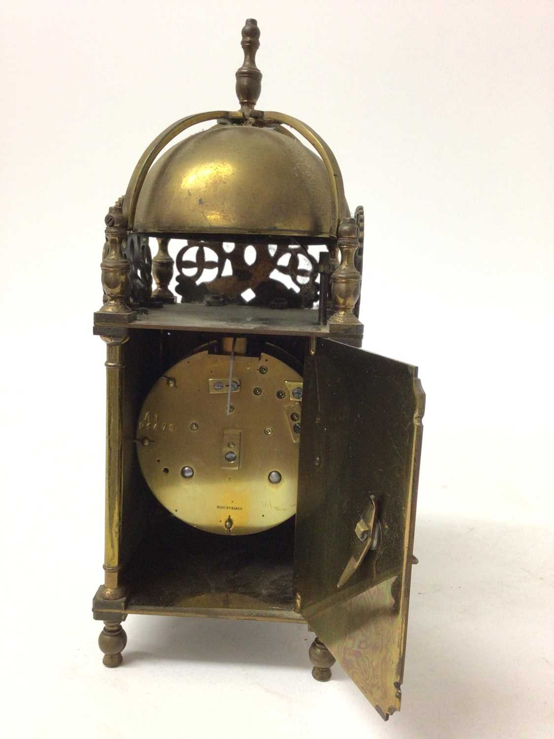 Lot 655 - 1930s Miniature brass lantern clock with