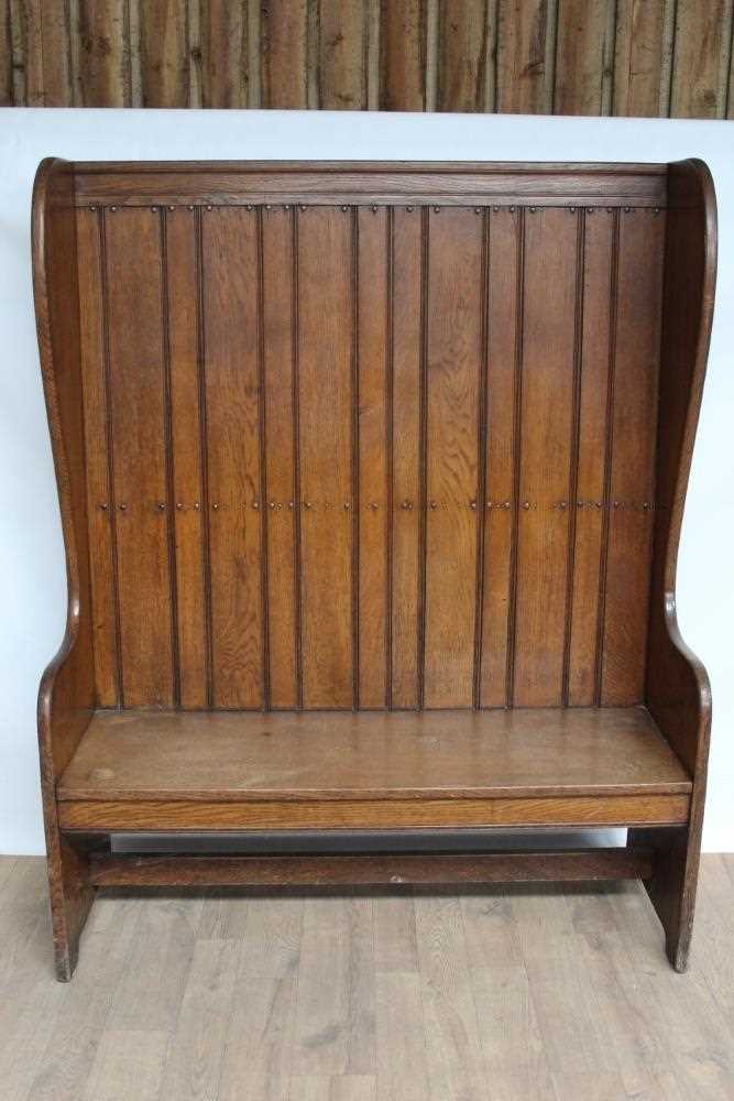 Lot 1345 - Oak high back settle in the antique style