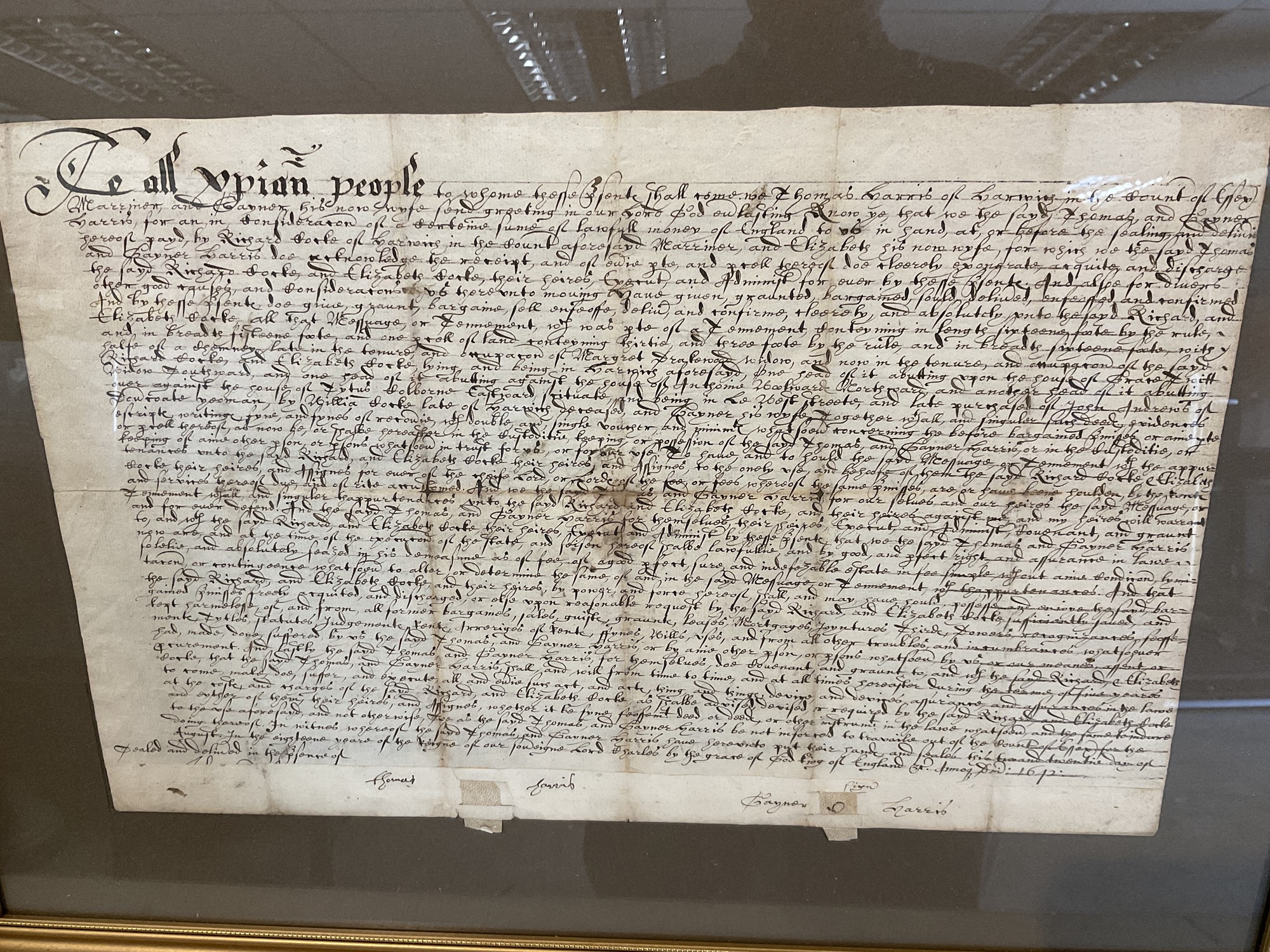 Lot 1462 - 17th century glazed indenture framed