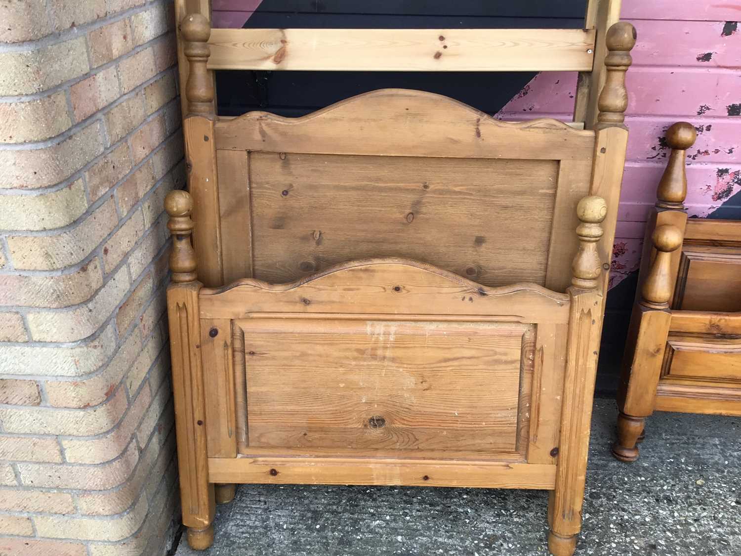 Lot 933 - Stained pine single bed with head and foot