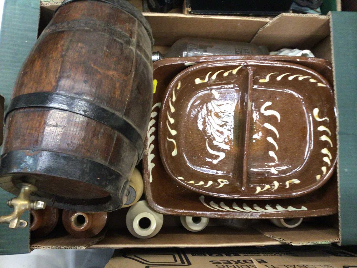 Lot 440 - Slip ware dishes, antique glass bottles,