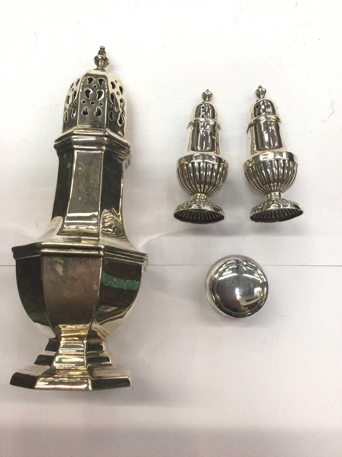 Lot 711 - Silver caster, pair smaller silver casters