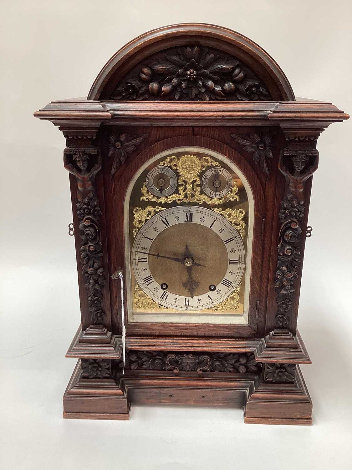 Lot 2414 - A late Victorian carved oak case chiming