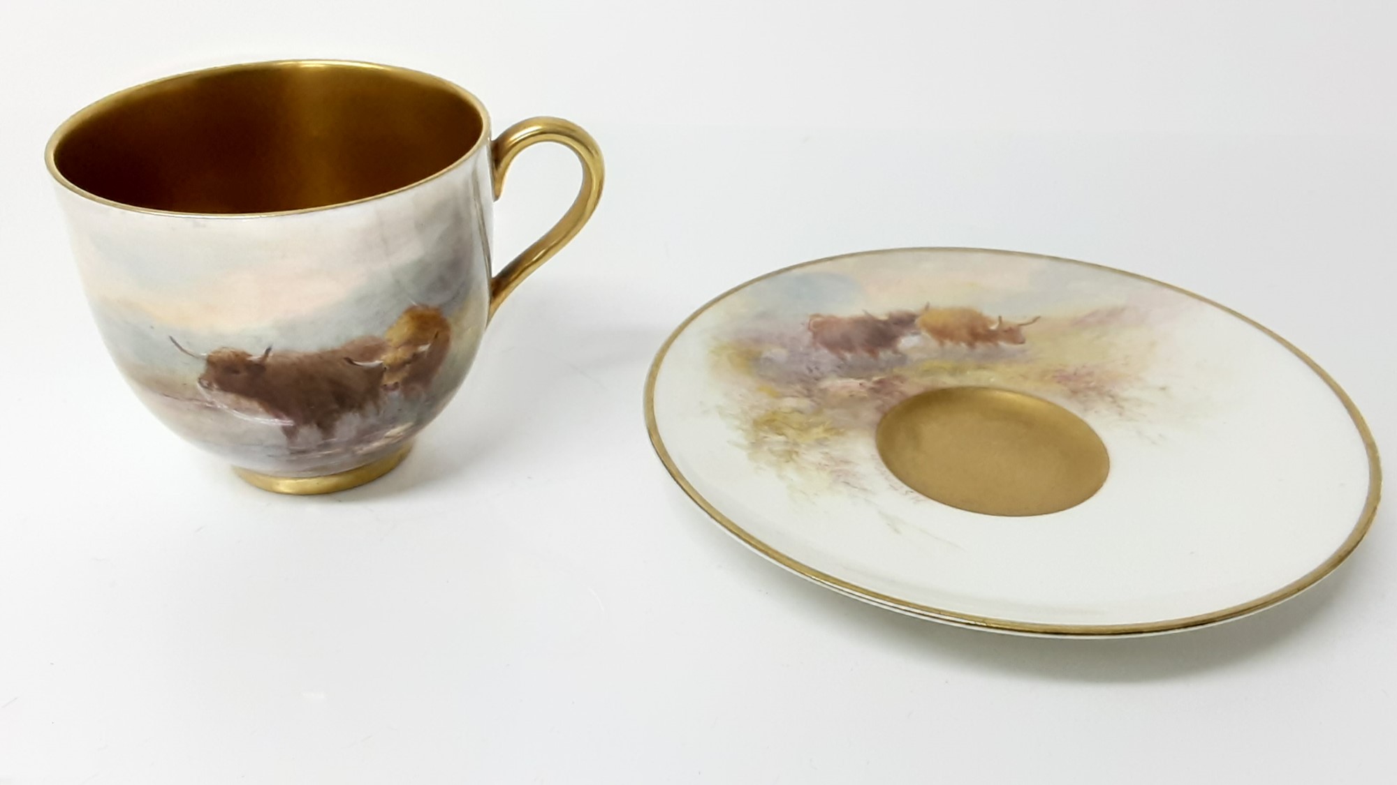 Lot 1065 - Royal Worcester cabinet cup and saucer with