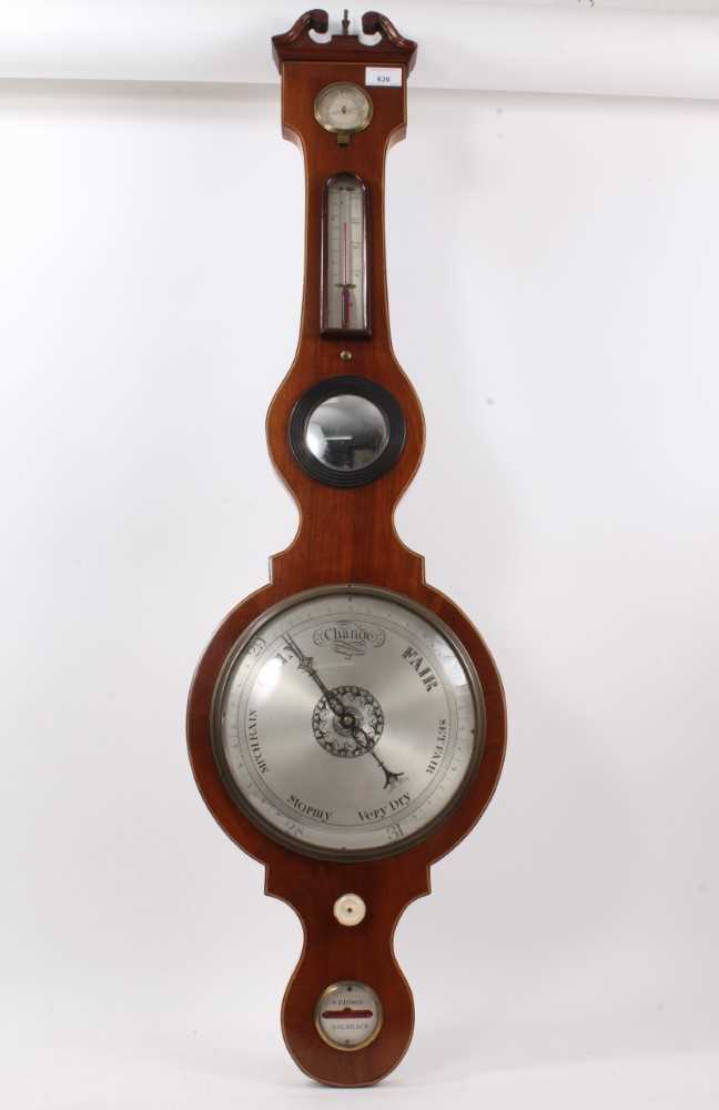 Lot 620 - A George III mahogany barometer