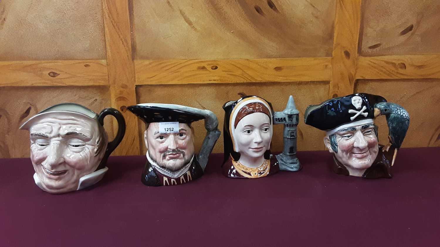 Lot 1252 - Nine large Royal Doulton character jugs