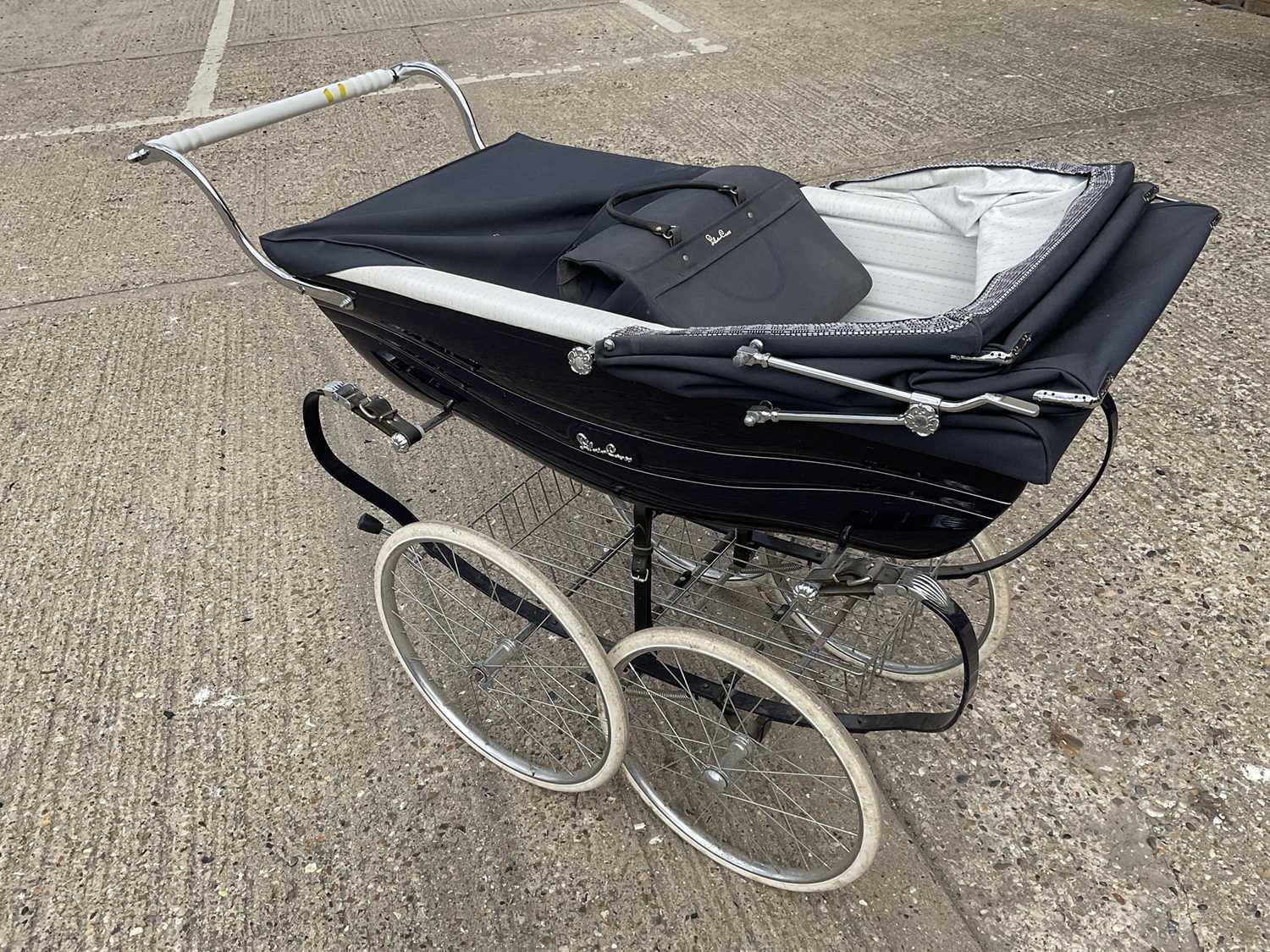 Lot 555 - Silver Cross perambulator and a wicker