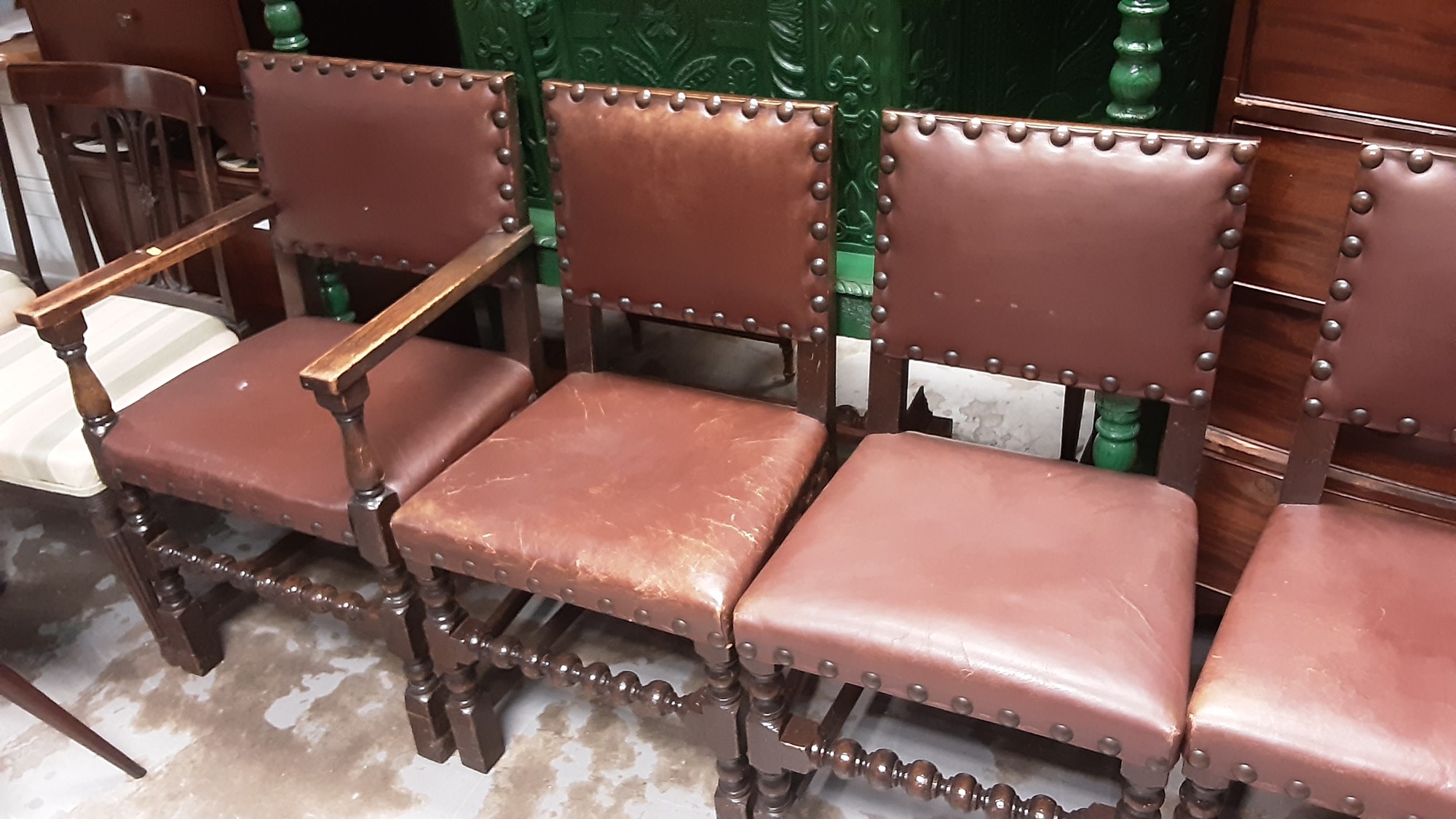 Lot 1272 - Set of six oak dining chairs with studded