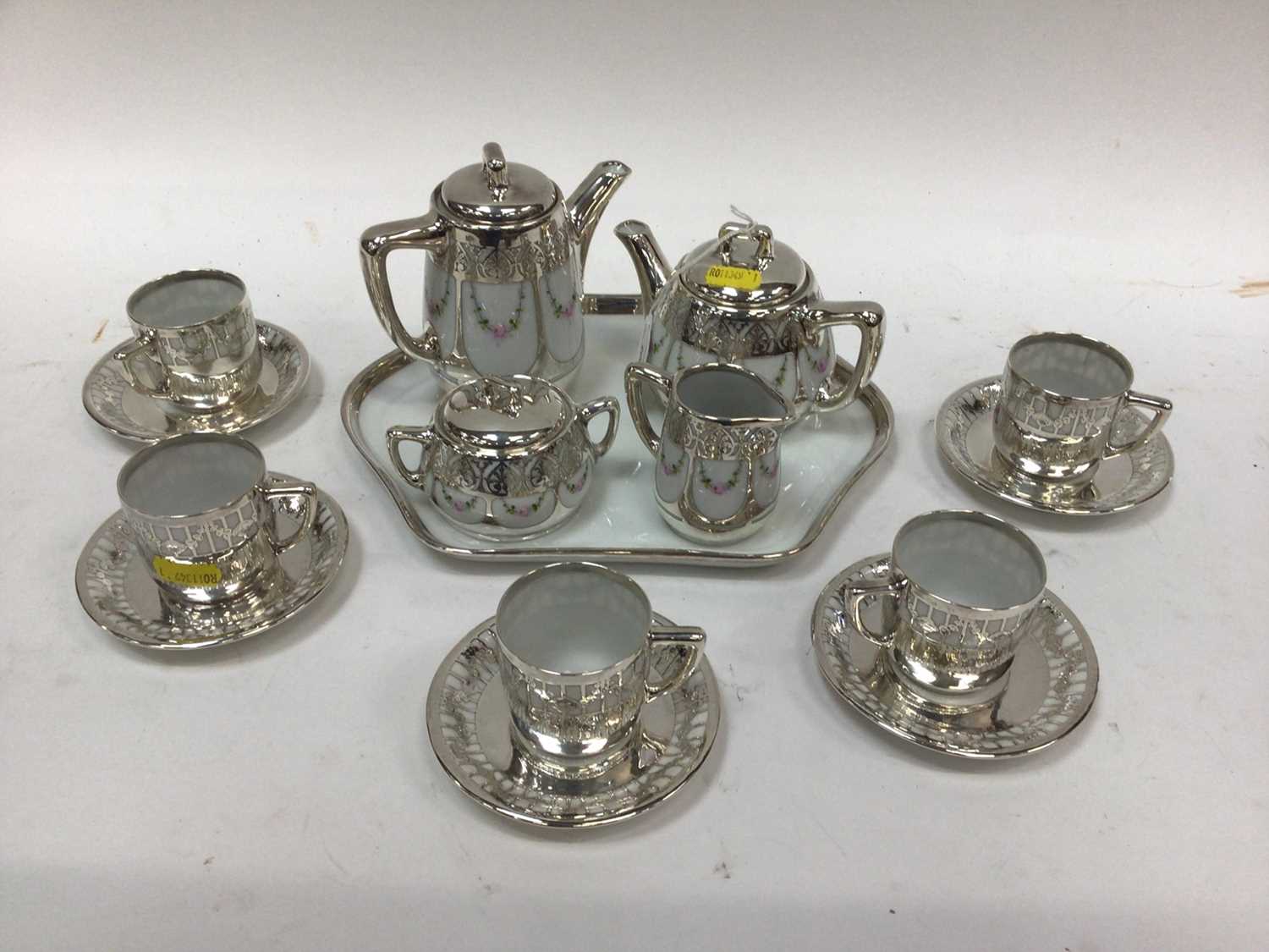 Lot 1086 - White metal mounted German tea and coffee