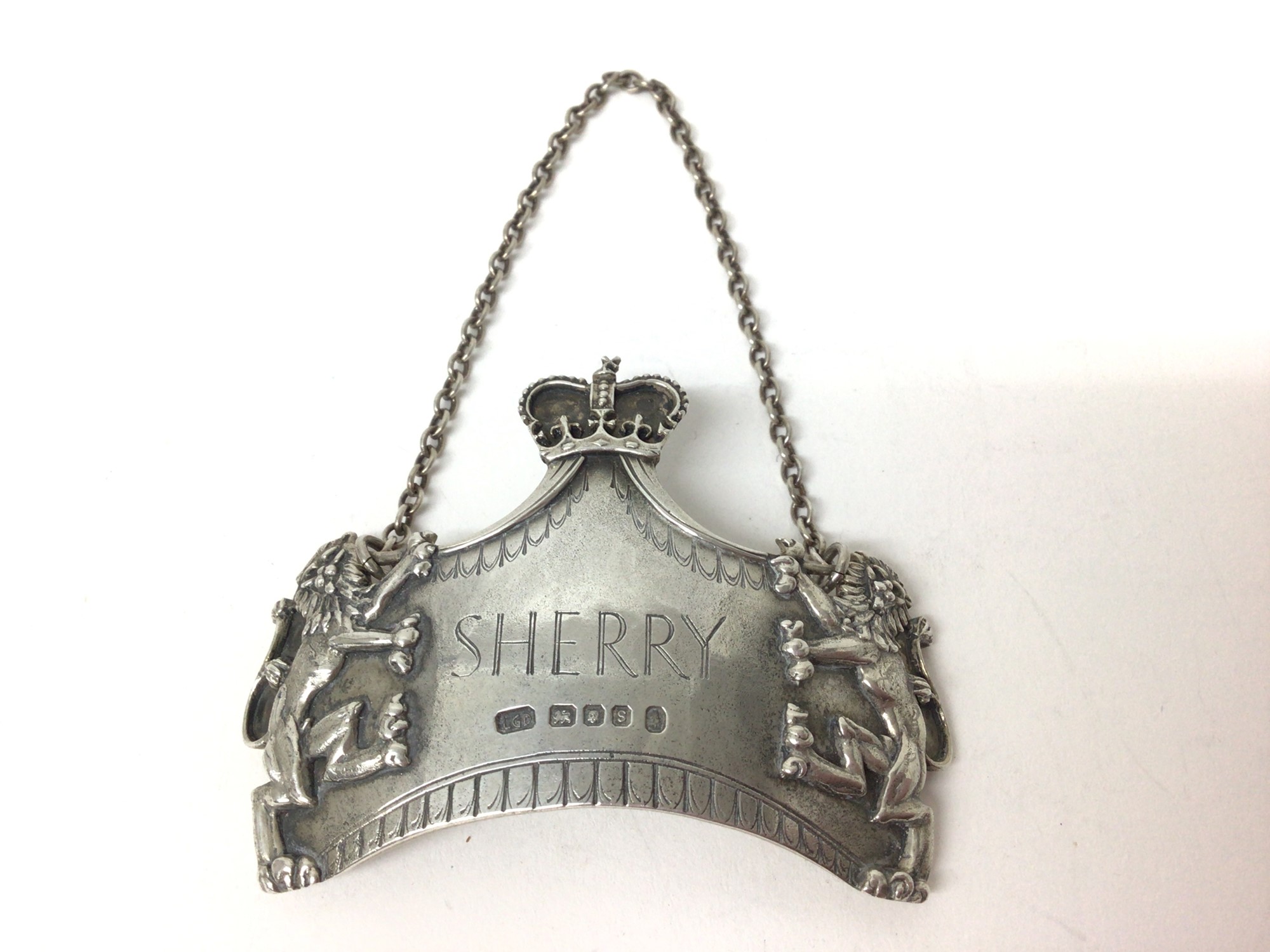 Lot 186 - Modern silver sherry label decorated with