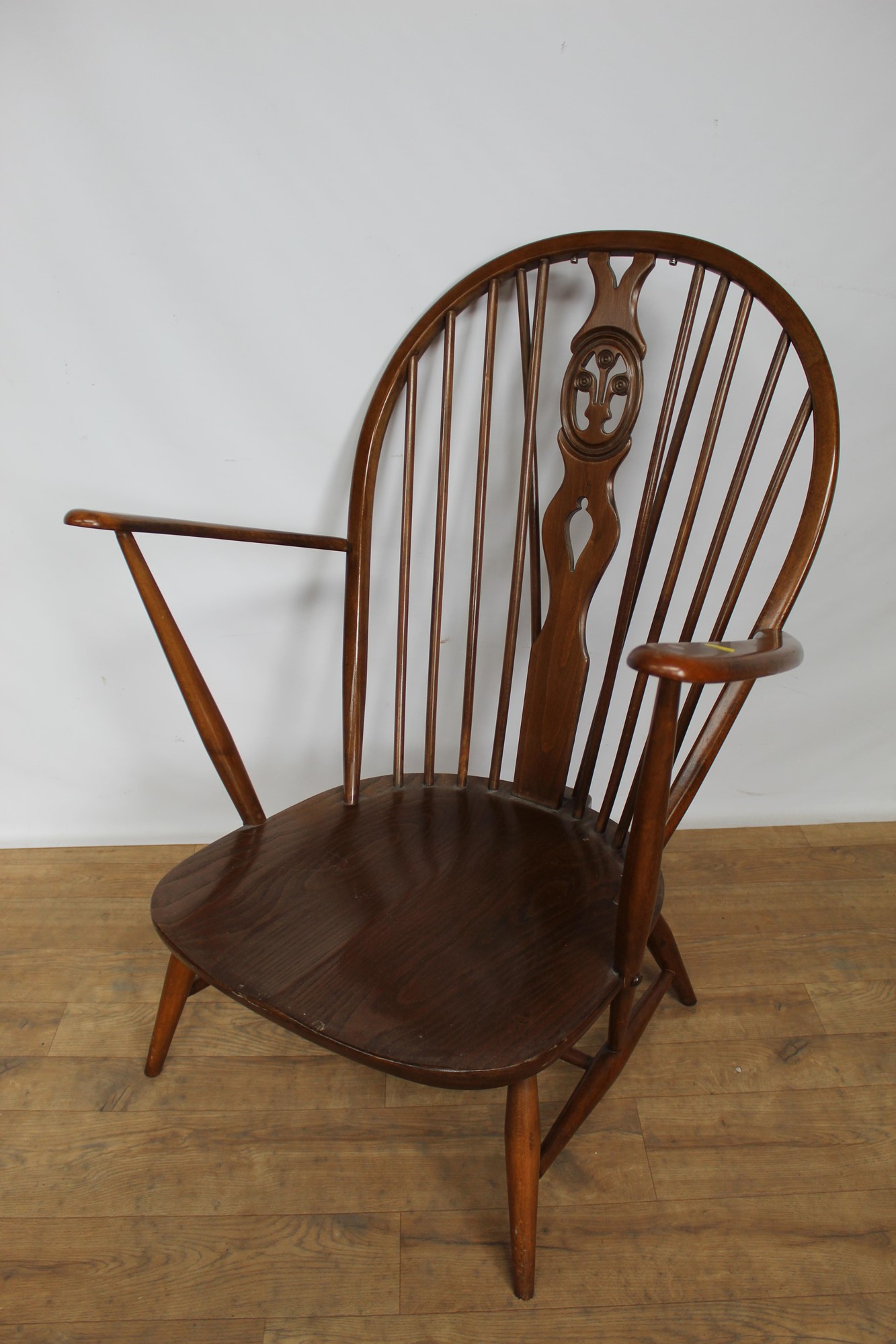 Lot 166 - Ercol-style two seater sofa and three