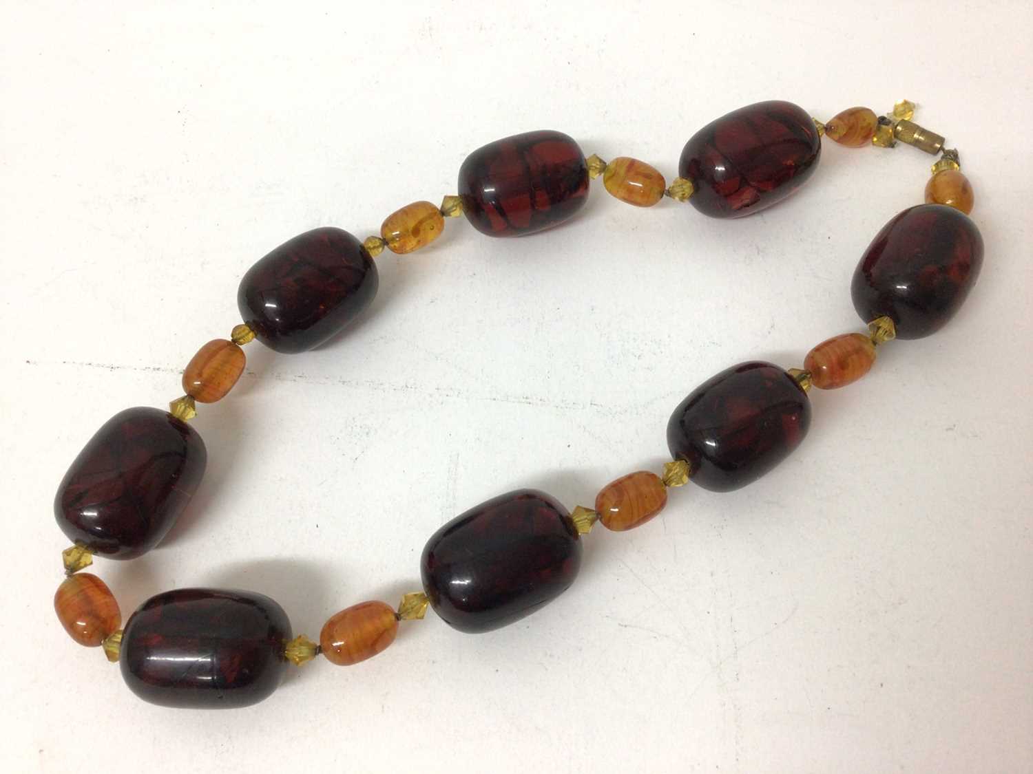 Lot 239 - Simulated amber necklace