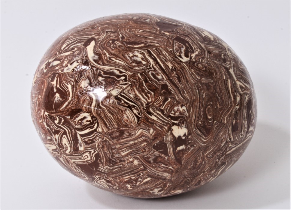 Lot 189 - Unusual agate ware pottery oval ball