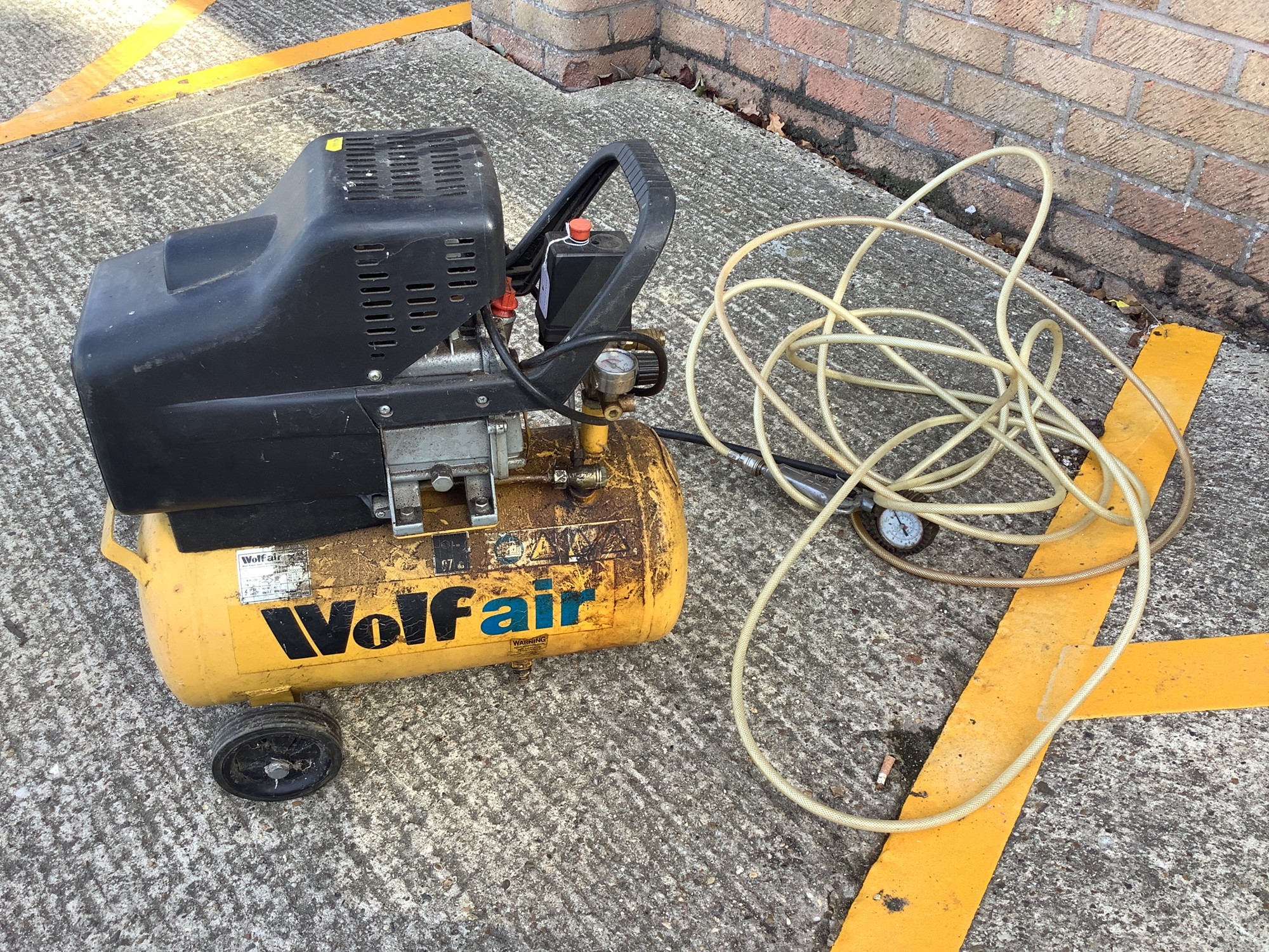 Lot 4 Wolf air Compressor