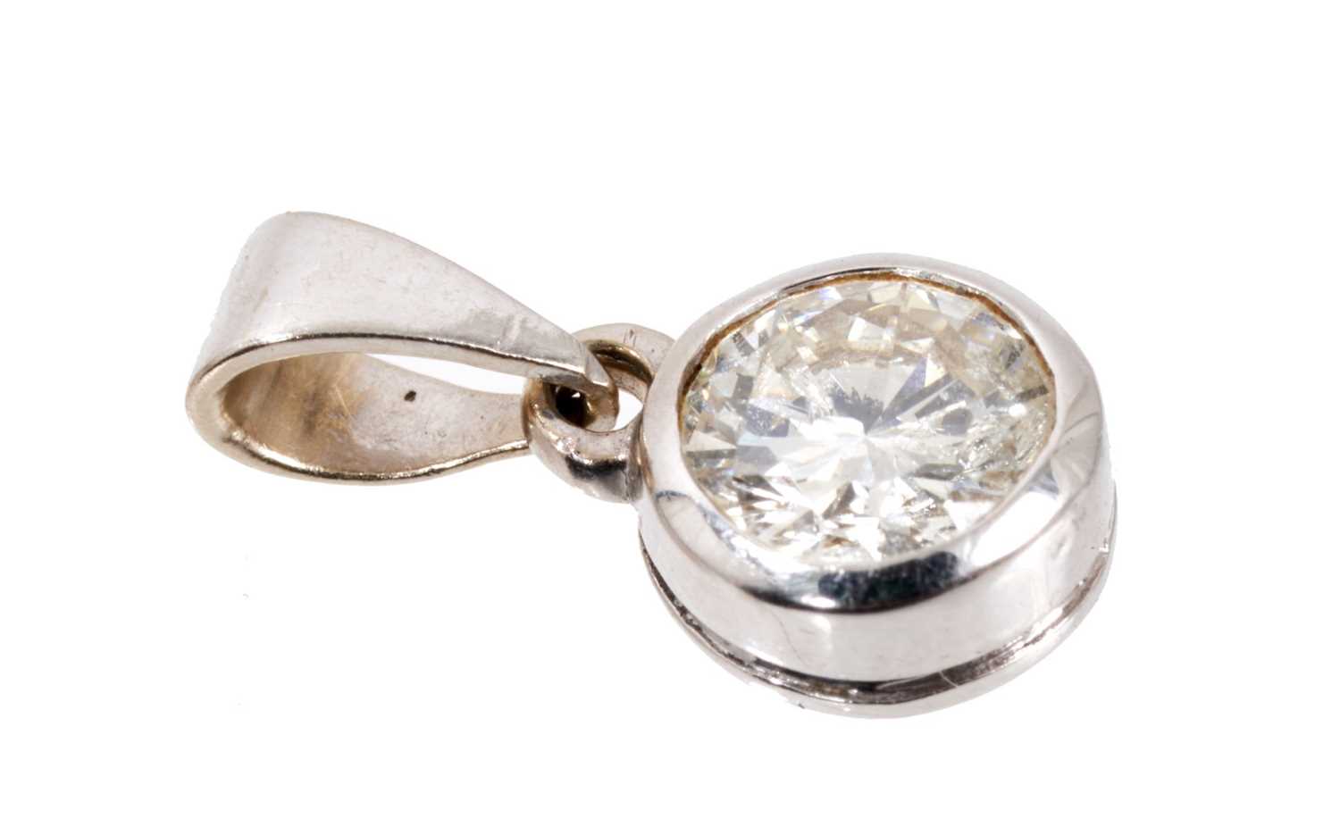 Lot 681 - Diamond single stone pendant with a round