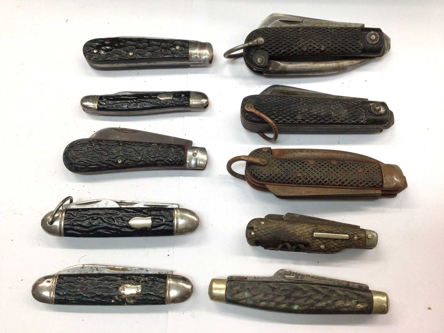 Lot 437 - Group of ten military issue and other knives.