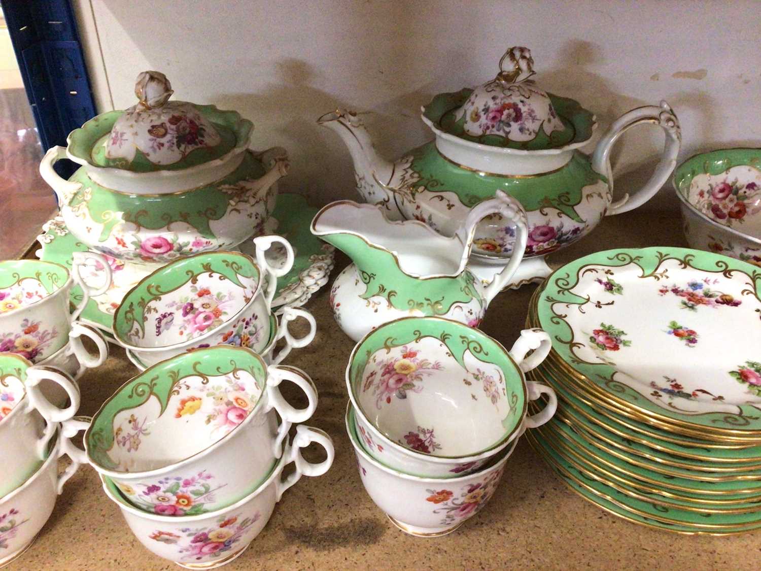 Lot 411 - Floral tea service on green ground, Minton