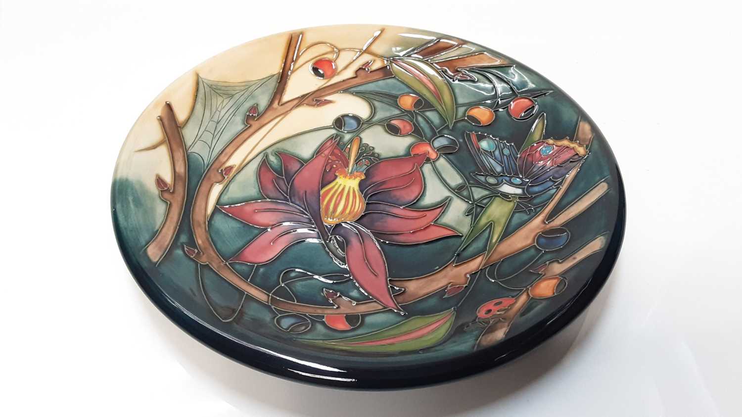 Lot 1228 - Moorcroft pottery plate decorated in the