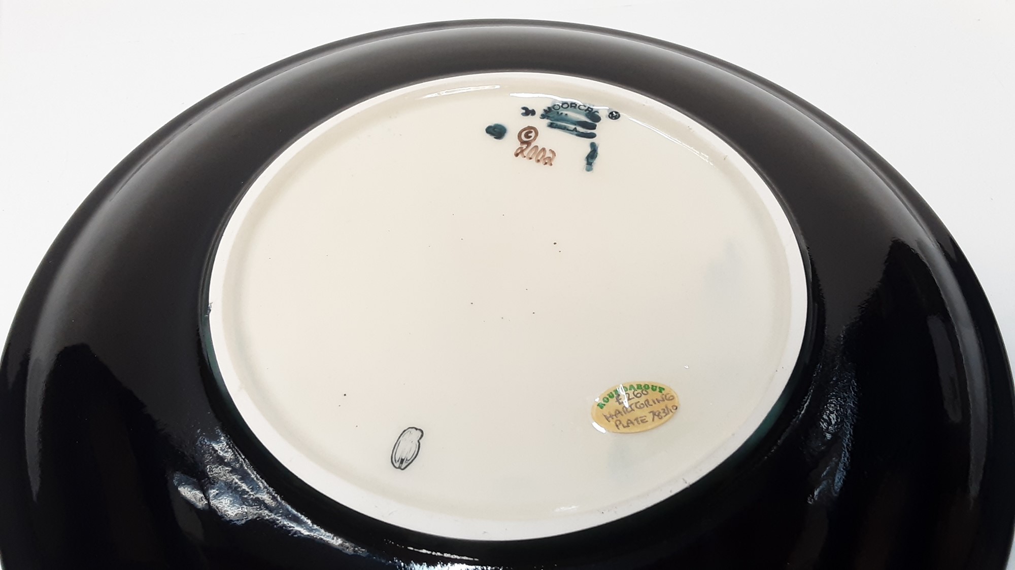 Lot 1228 - Moorcroft pottery plate decorated in the