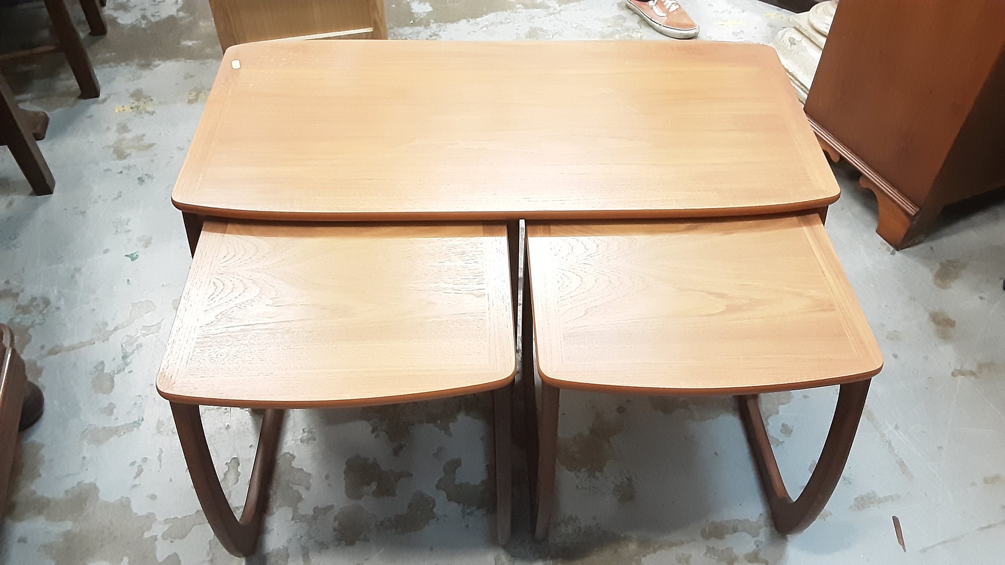 Lot 1078 - Nathan Furniture nest of three teak