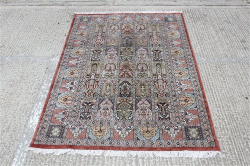 Lot 1229 - Eastern rug with five rows of ornamental