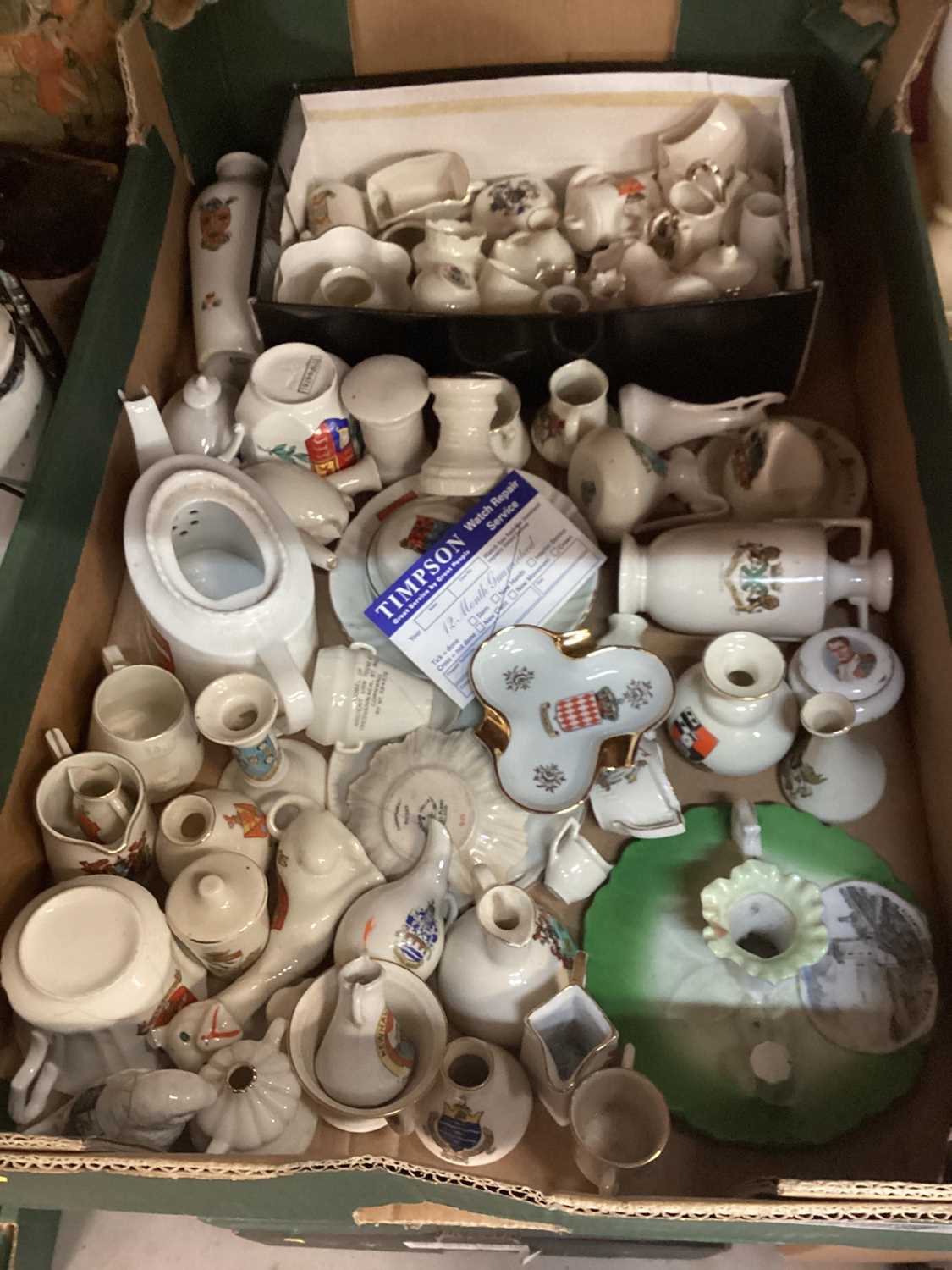 Lot 658 - Selection of crested ware, box of brassware
