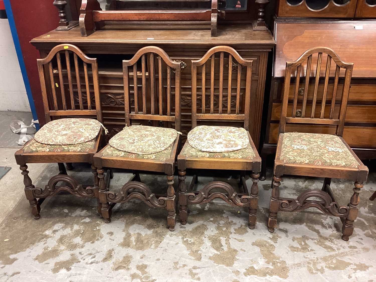 Lot 1141 - Set of four oak rail back dining chairs on