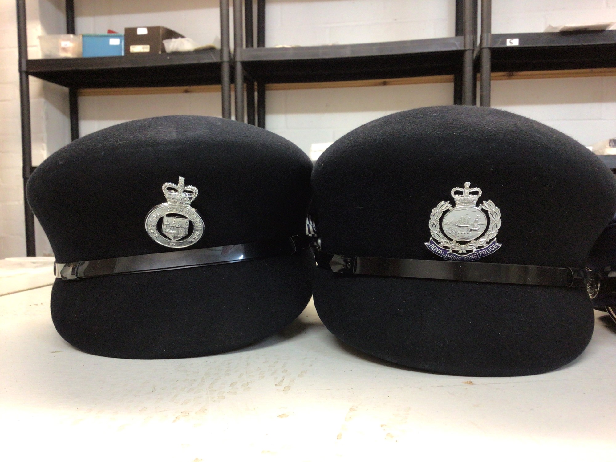 Lot 557 - Group of six Elizabeth II Police helmets for