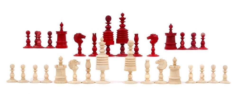 Lot 729 - 19th century carved and red stained bone