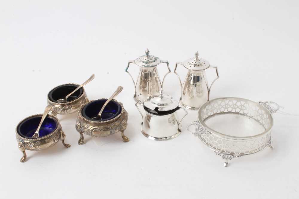 Lot 290 - Edwardian silver three piece condiment set,