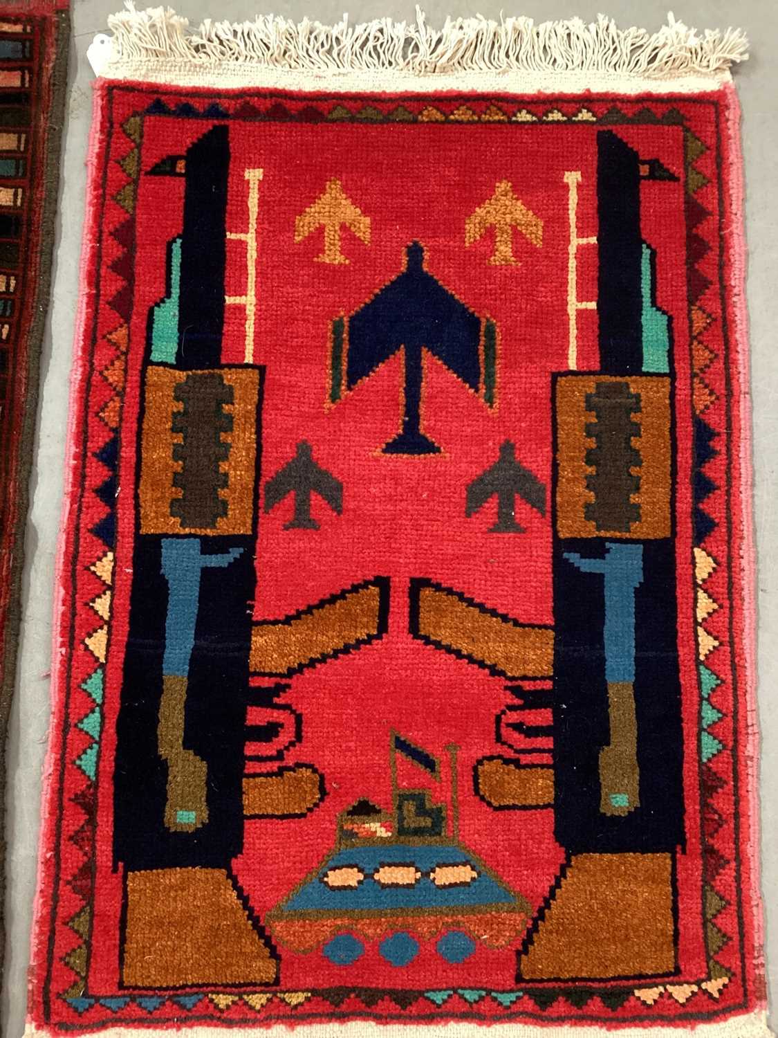 Lot 1523 - Two 1970s Afghan political rugs with war