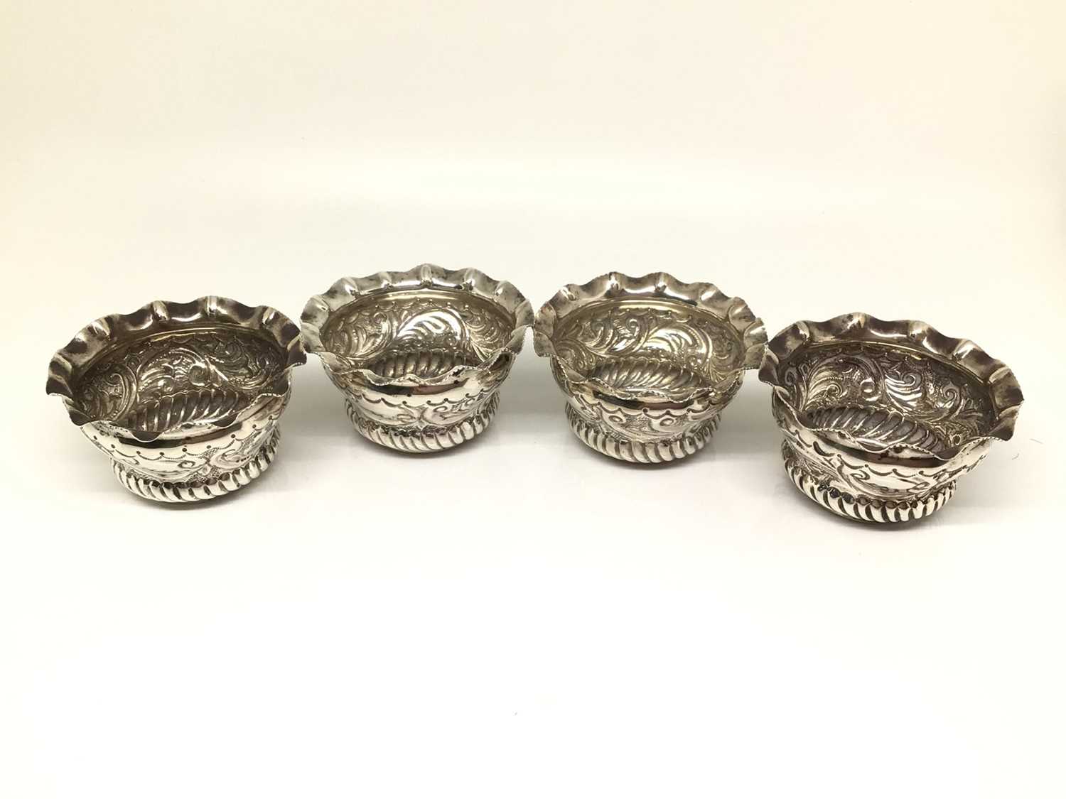 Lot 159 - Set of four Victorian floral silver bowls