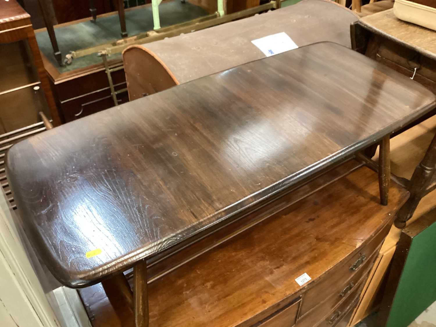 Lot 1276 - Ercol coffee table with magazine rack