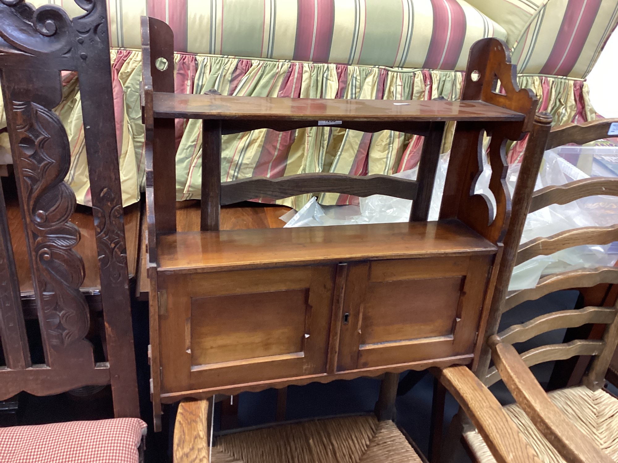 Lot 1432 - Oak stick back tub chair with cane seat