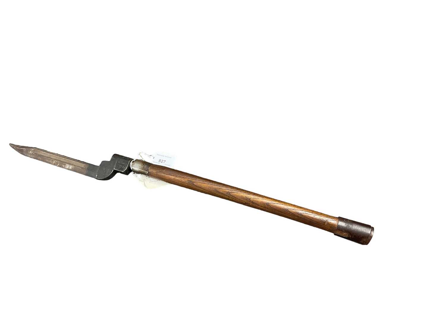 Lot 827 - Bayonet and Trenching tool, mounted with a