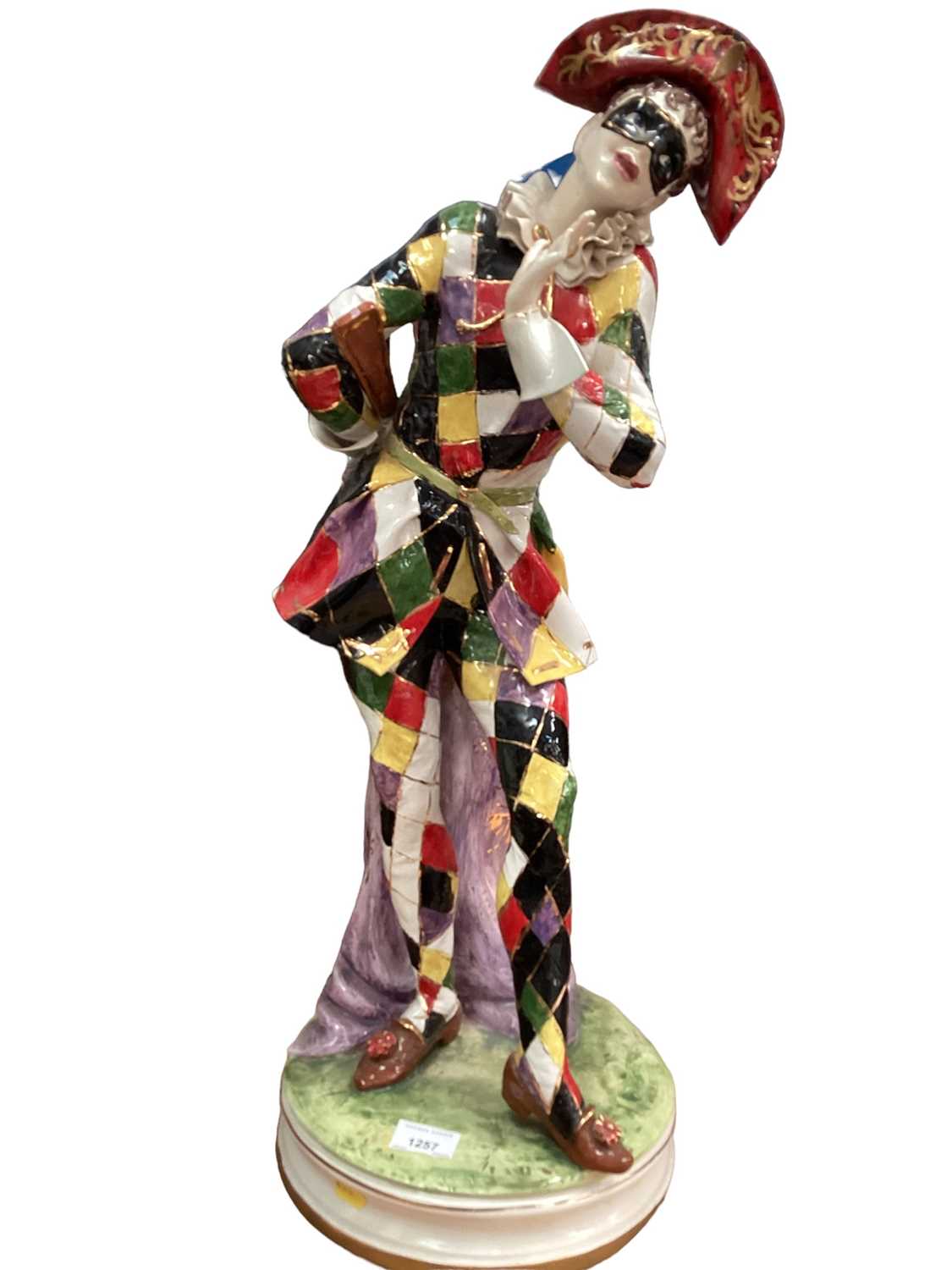Lot 1257 - Large Italian figure - Harlequin