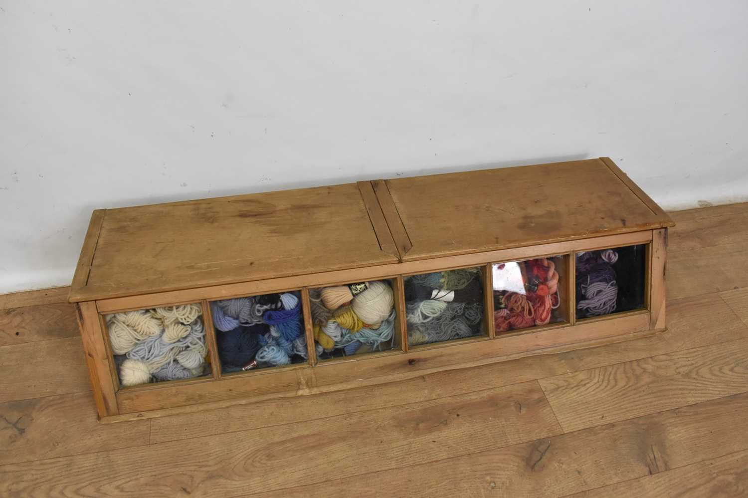 Lot 1340 - Antique retailers pine glazed tabletop wool