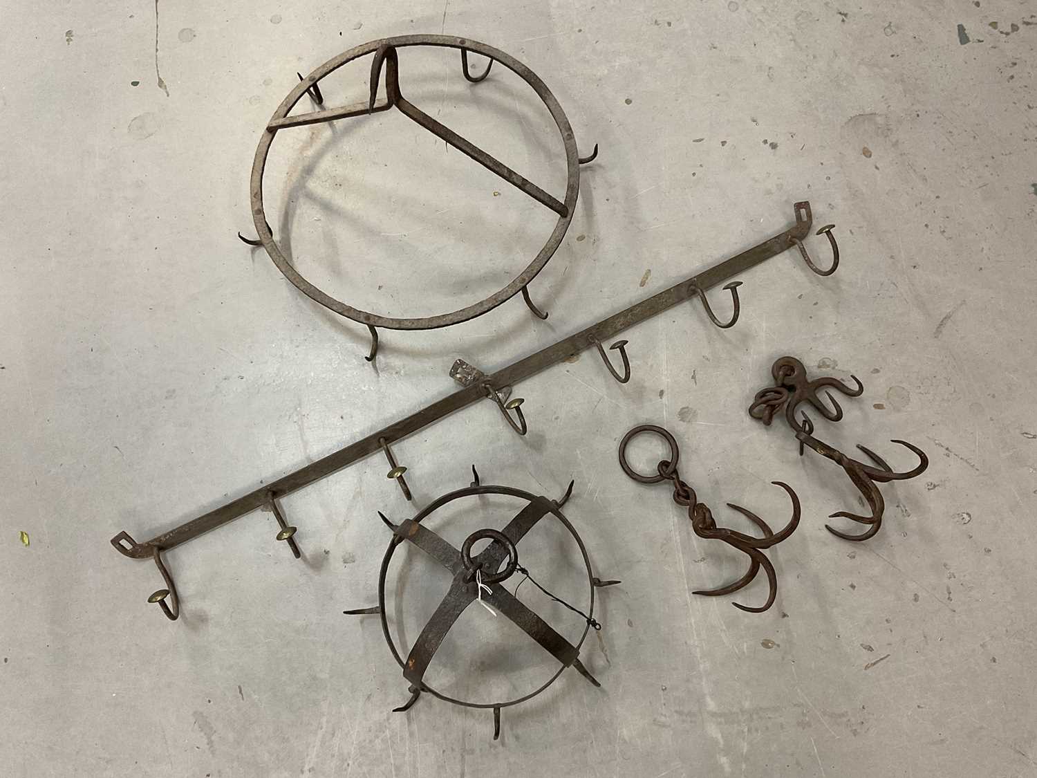 Lot 1383 - Antique wrought iron hanging game rack, and