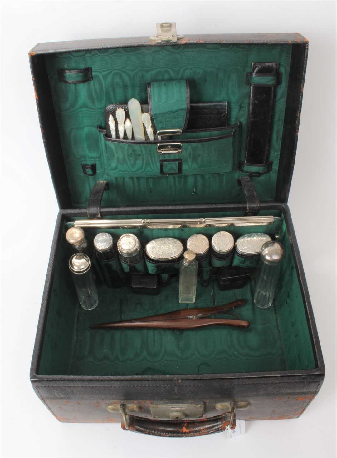 Lot 218 - Victorian leather toiletry case containing