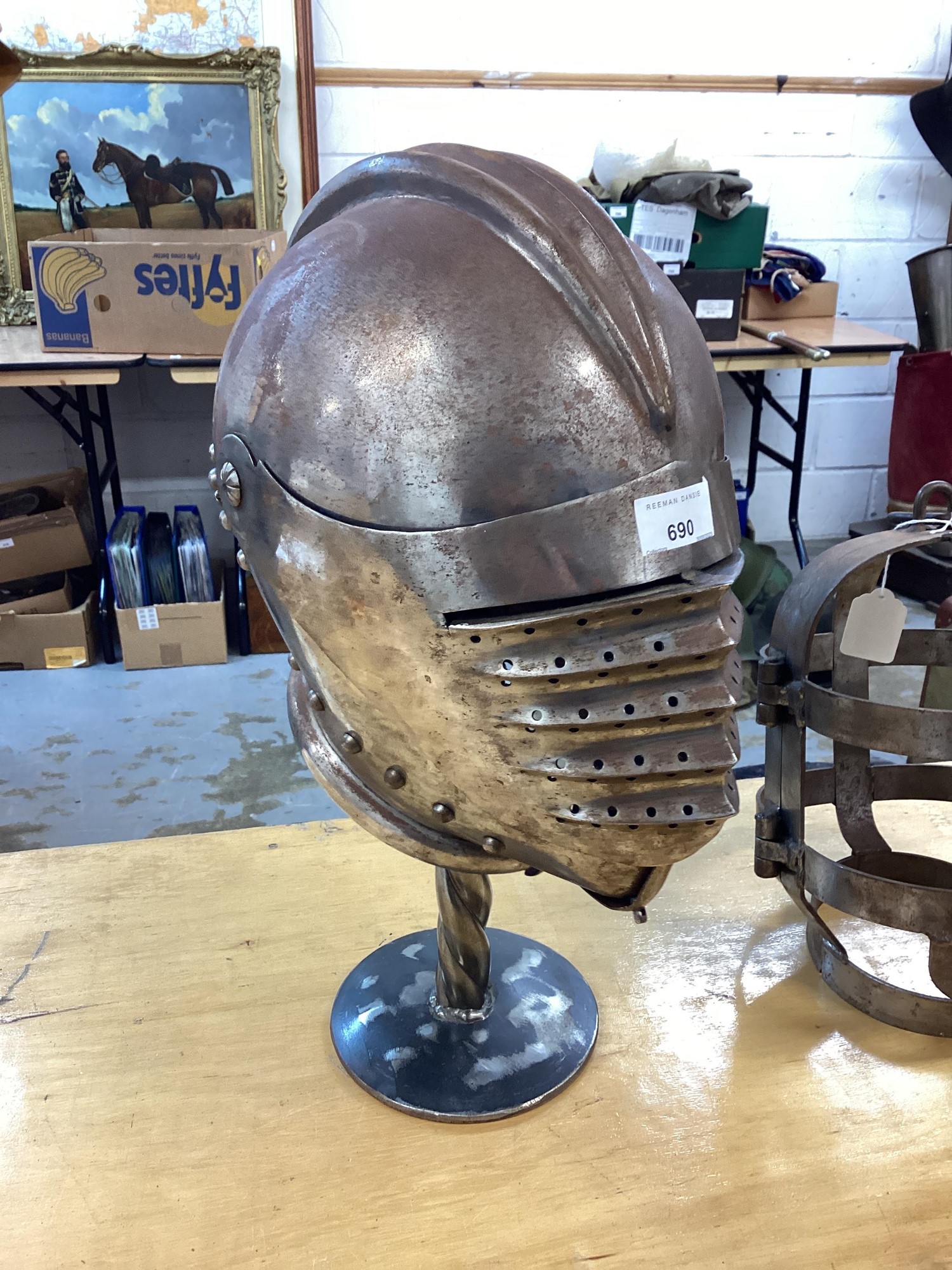 Lot 690 - Reproduction steel knights helm with fluted