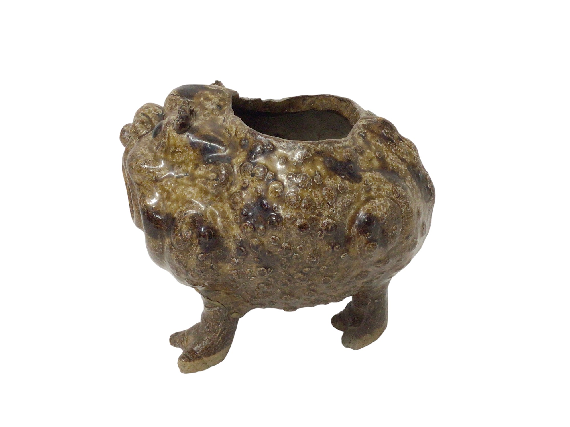 Lot 29 - A grotesque three-legged pottery toad