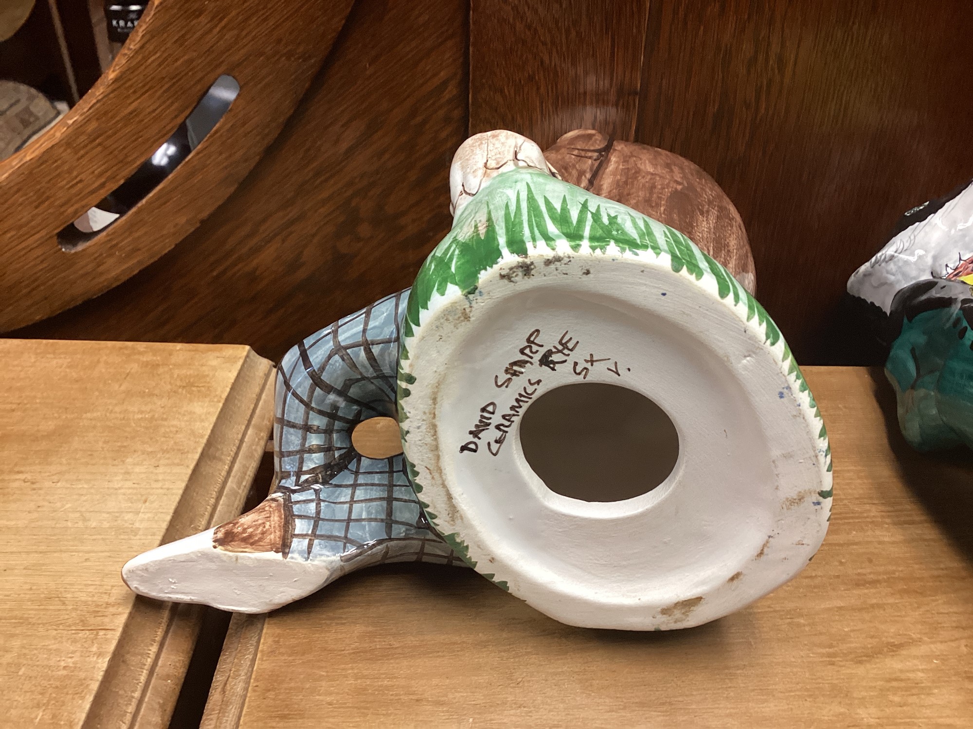 Lot 694 - Two Rye pottery figures