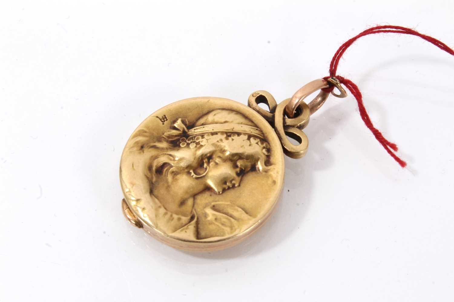 Lot 843 - French gold locket with embossed profile