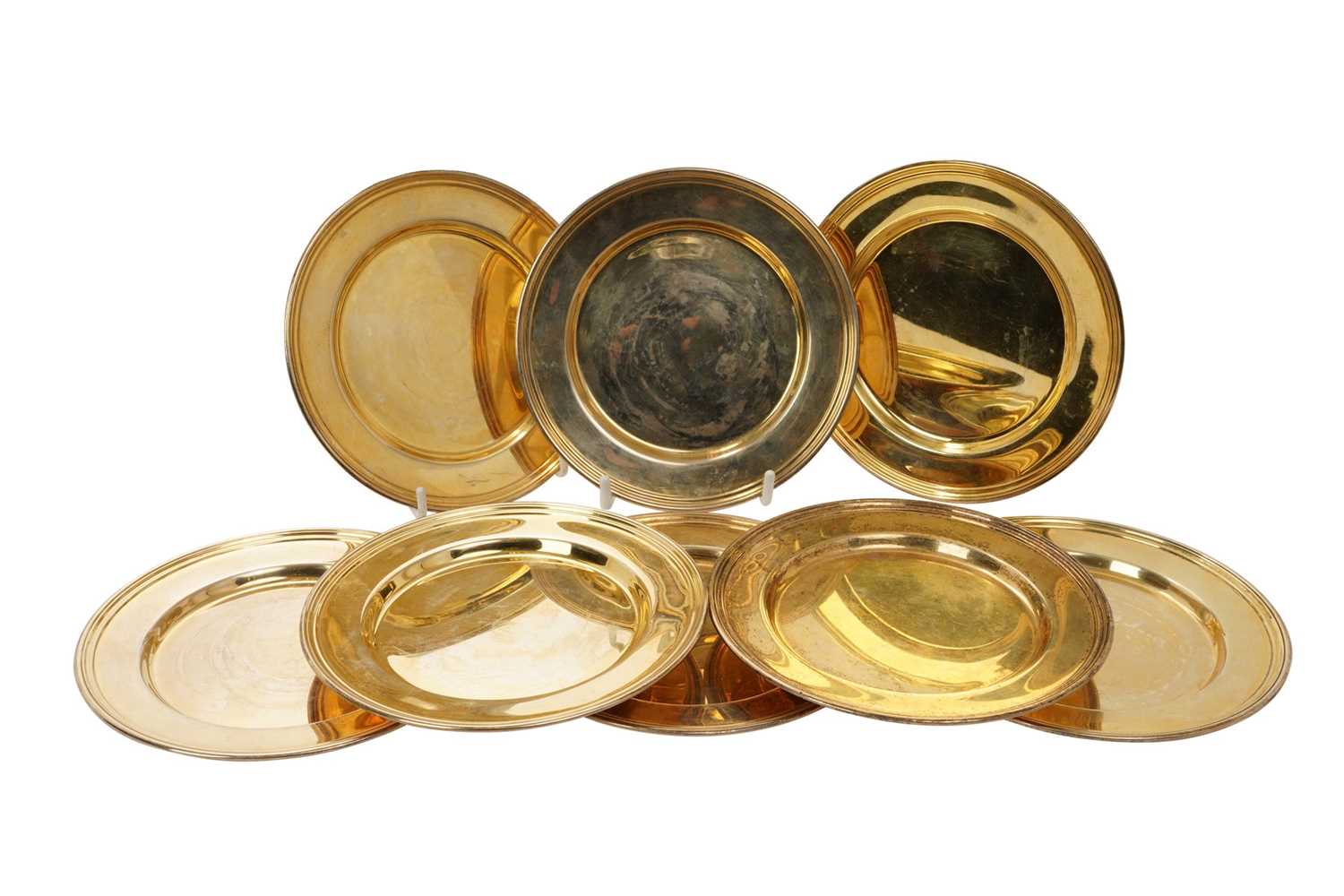 Lot 385 - A set of eight sterling silver gilt side