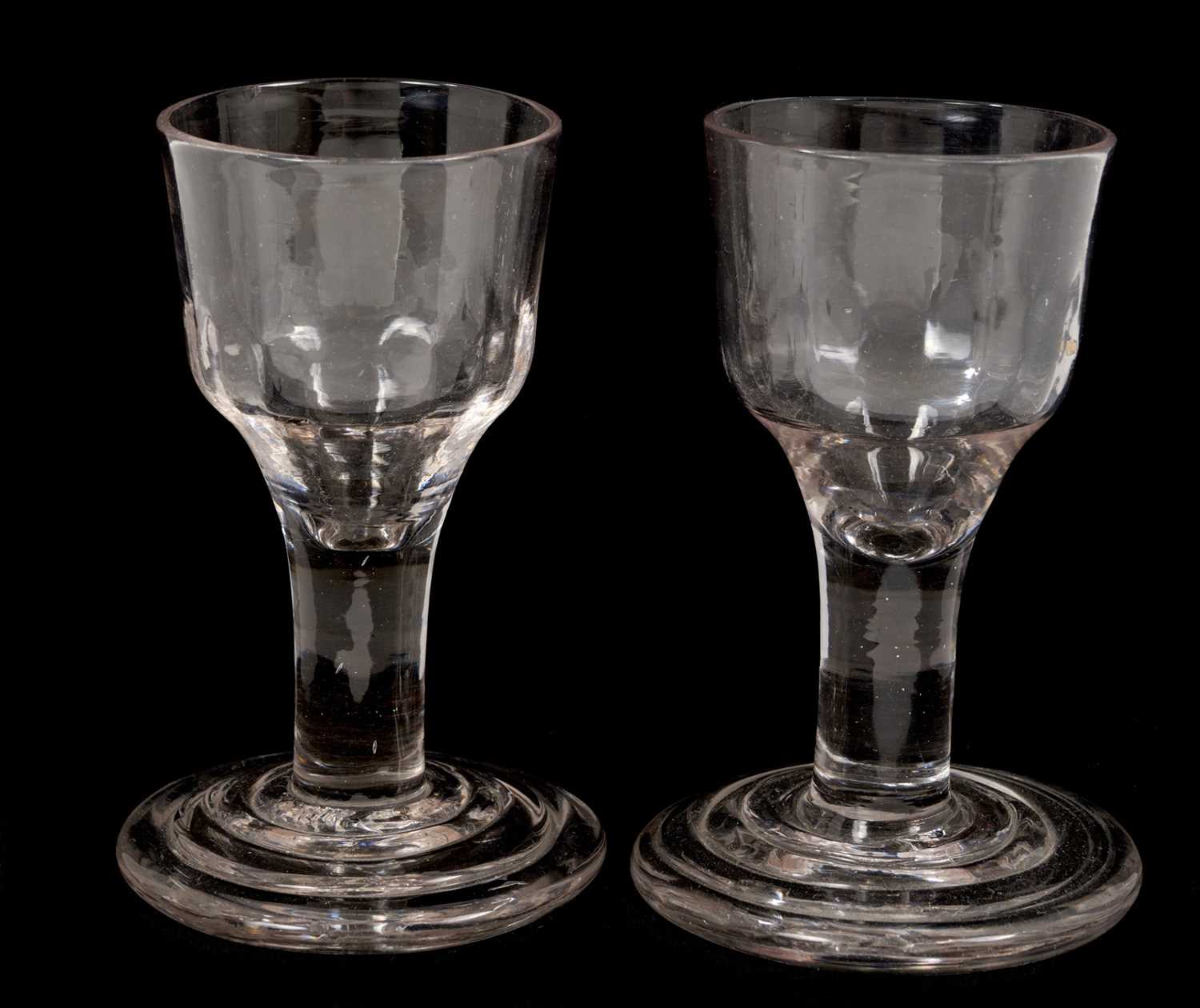 Lot 41 - A pair of Georgian firing glasses, with